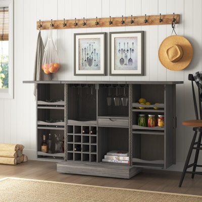 Bar cabinet with expandable top store